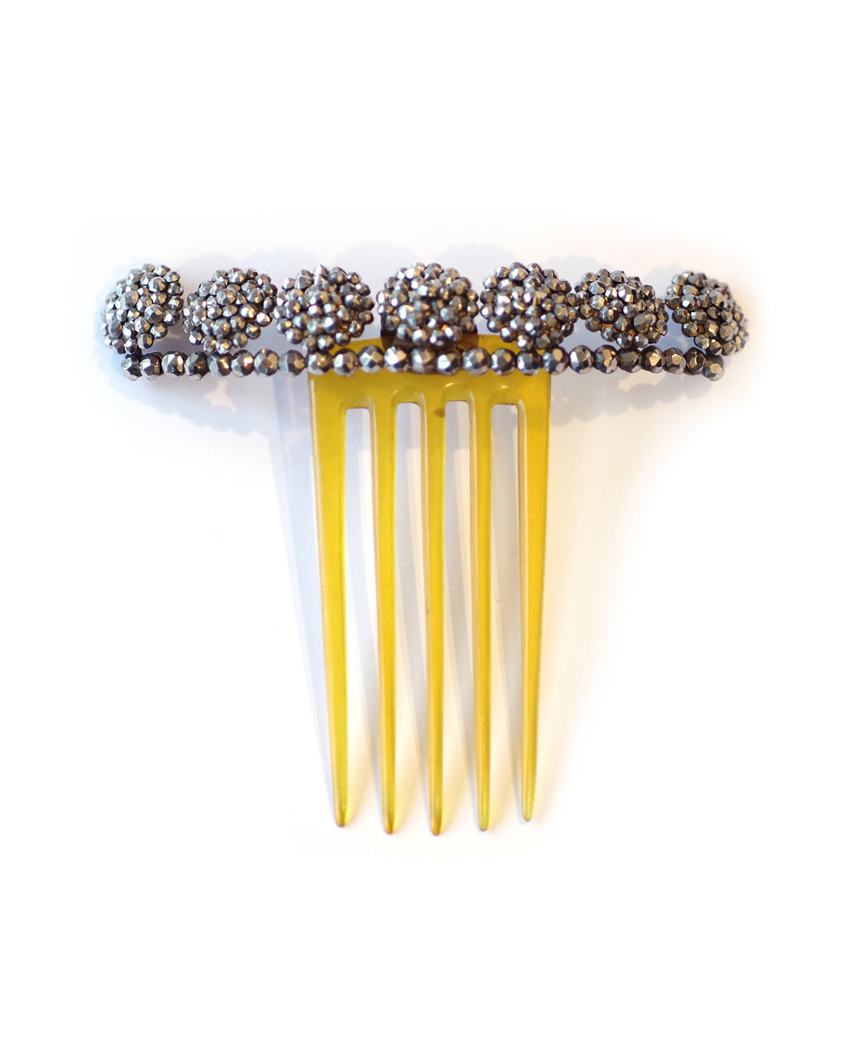 Steel spike hair comb